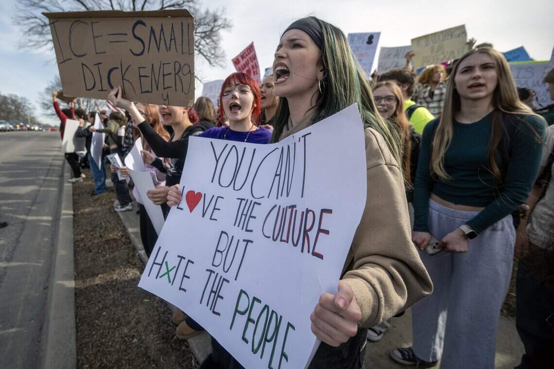 Johnson County teens protest ICE with student-led march | Kansas City Star