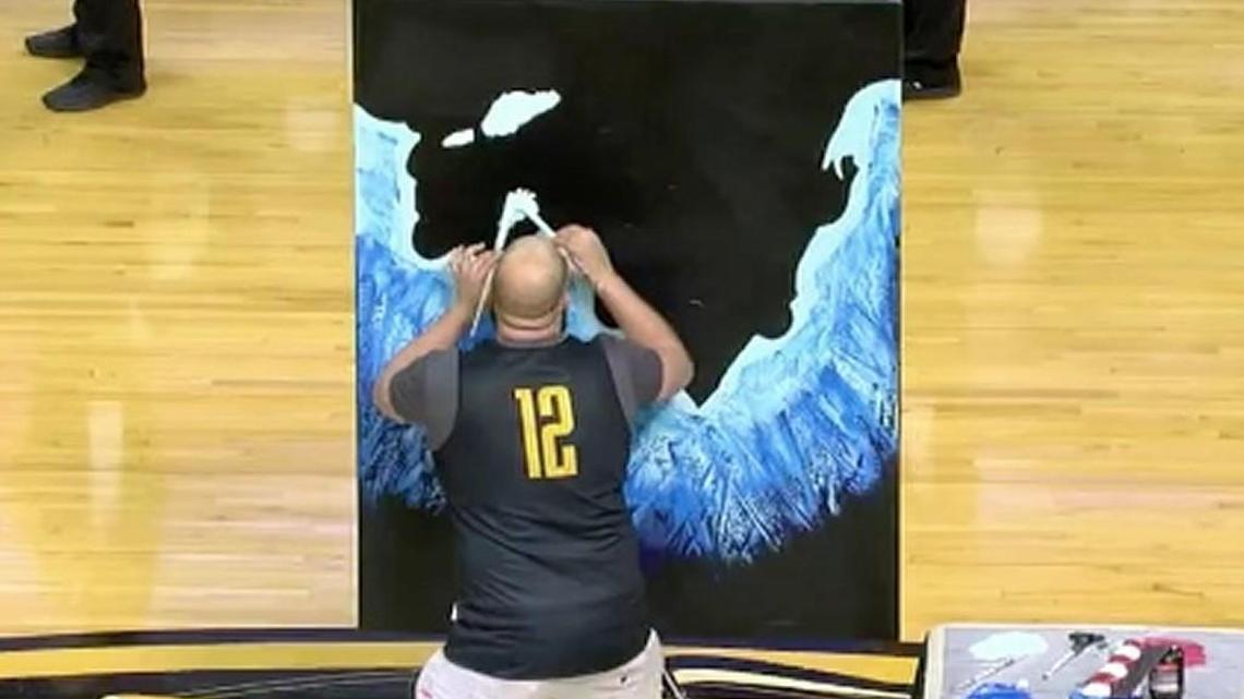National anthem rendition done while painting iconic image | Kansas ...